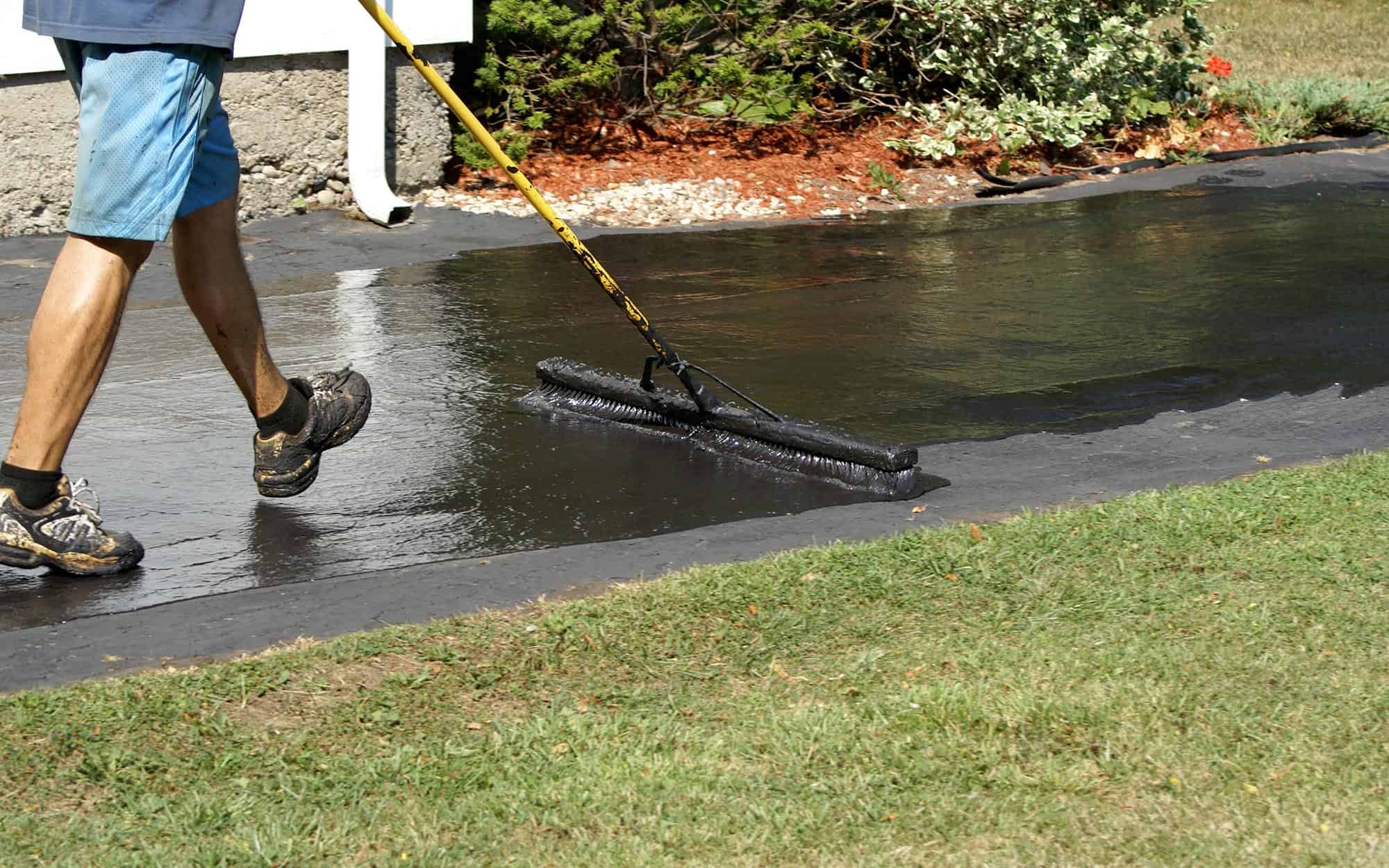 Driveway Resurfacing Signs: When to Call the Pros